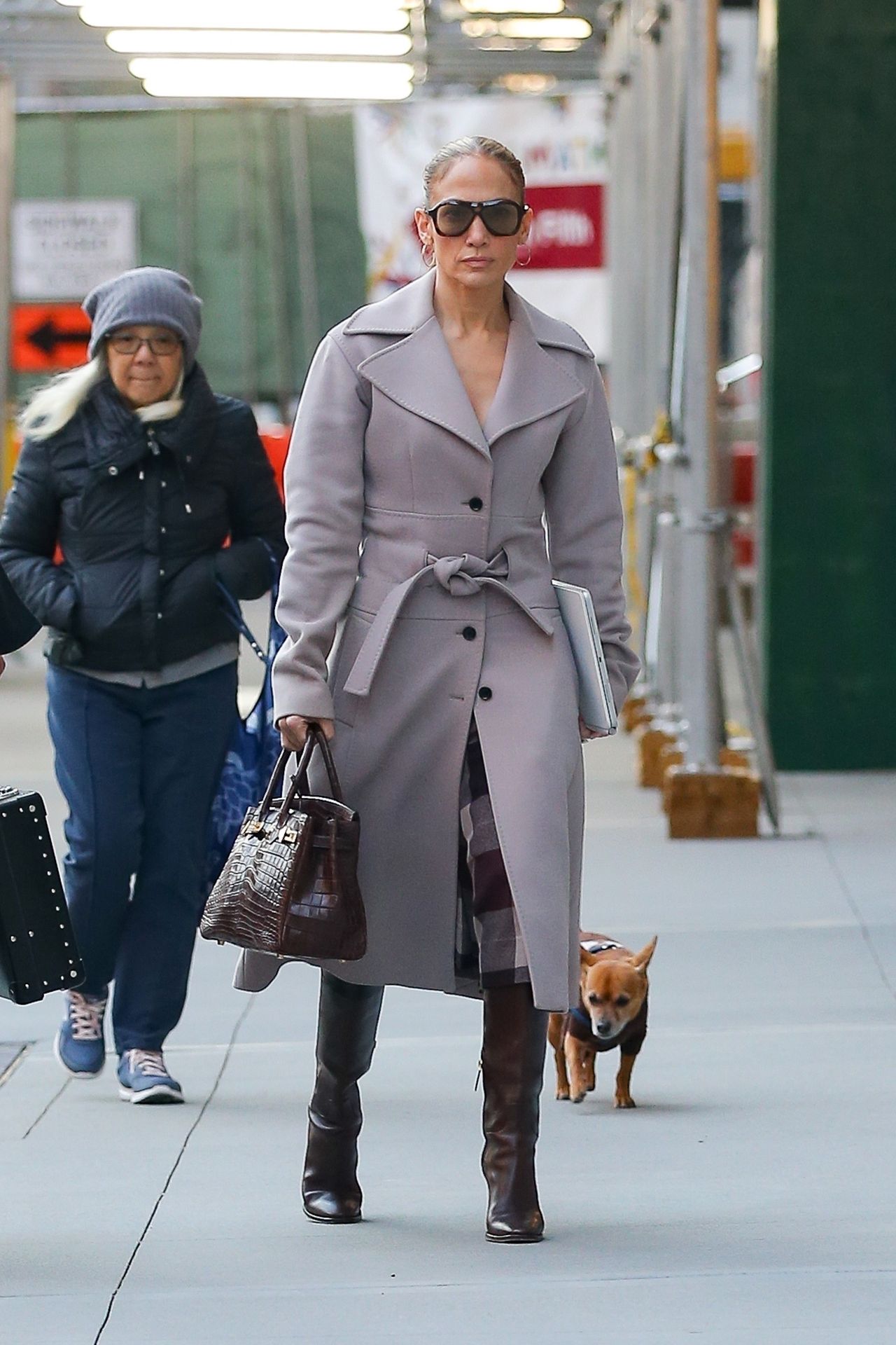 J.Lo Wore the Coat-and-Boots Outfit That Always Looks Elegant | Who ...