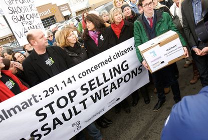 America's gun-control debate: The dueling protest signs | The Week