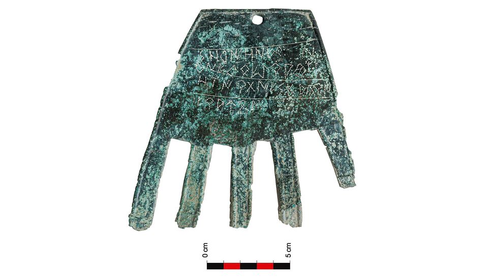Ancient language found on 2,100-year-old bronze hand may be related to ...