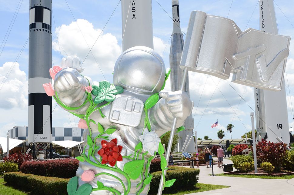 MTV reveals vine-covered 'Moon Person' at NASA rocket garden | Space