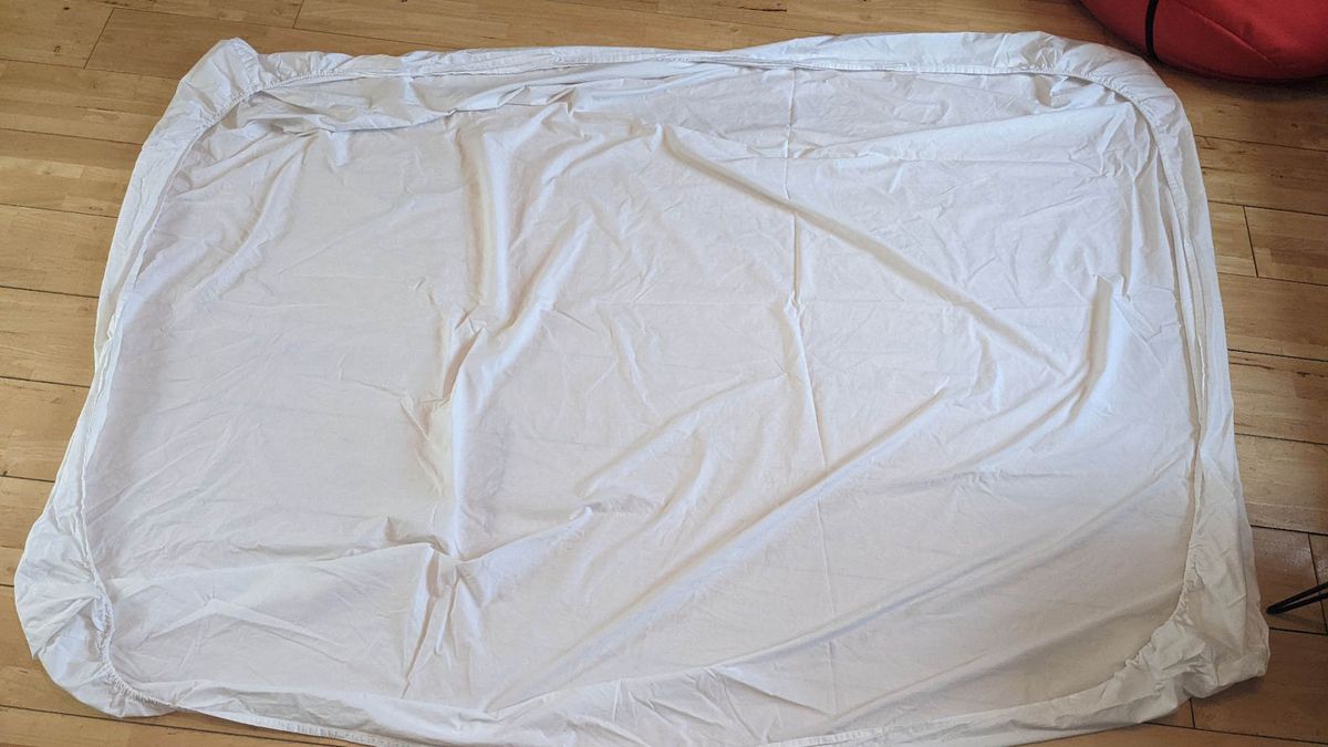 How to fold a fitted sheet in less than a minute | Tom's Guide