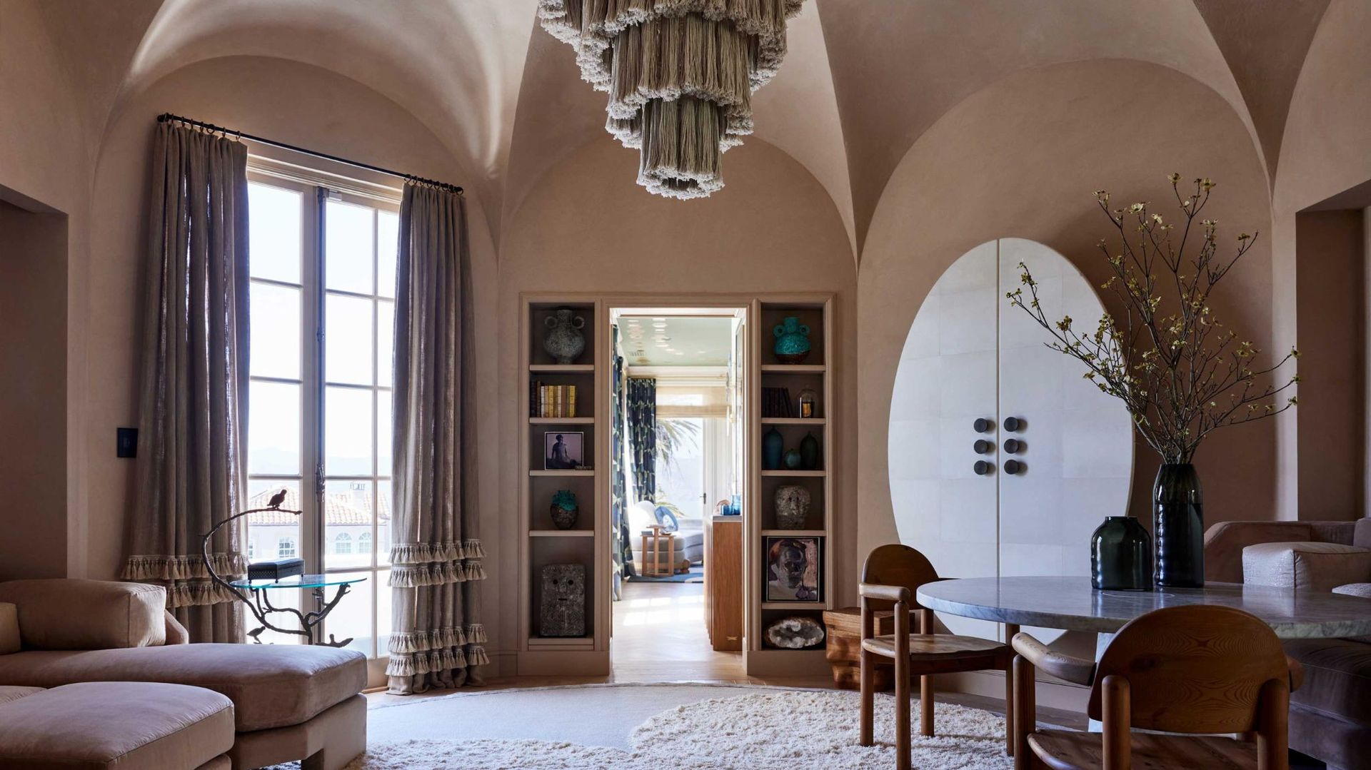 Terracotta lime wash and an umbrella vaulted ceiling in a monochromatic ...