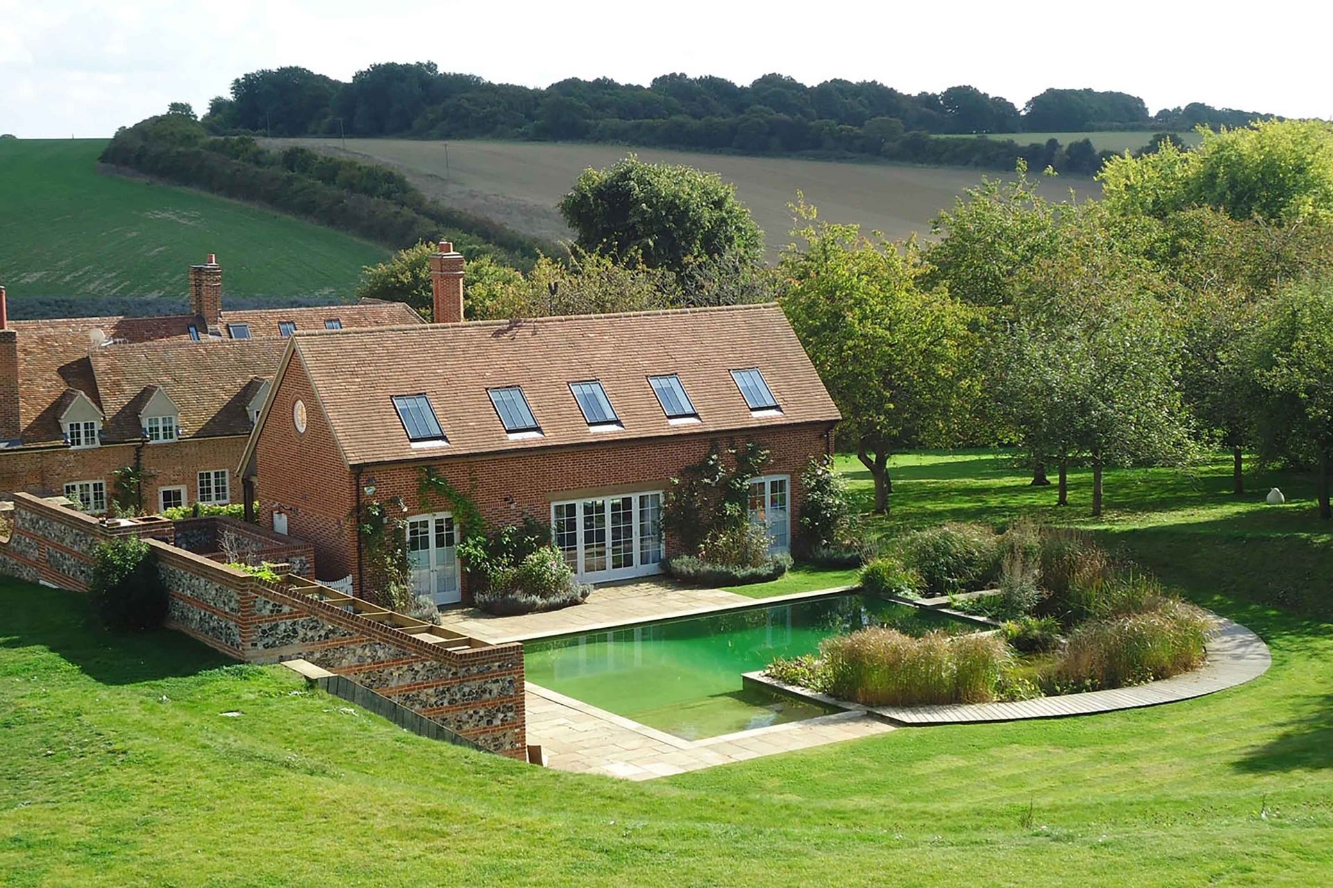 Natural pools: 10 stunning designs and ideas for backyard swimming ...