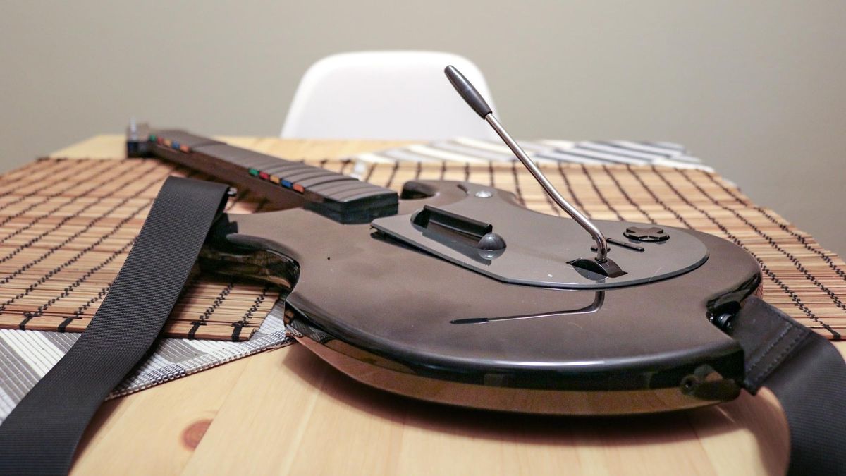 I just tried this new guitar controller — and it's perfect for reliving ...