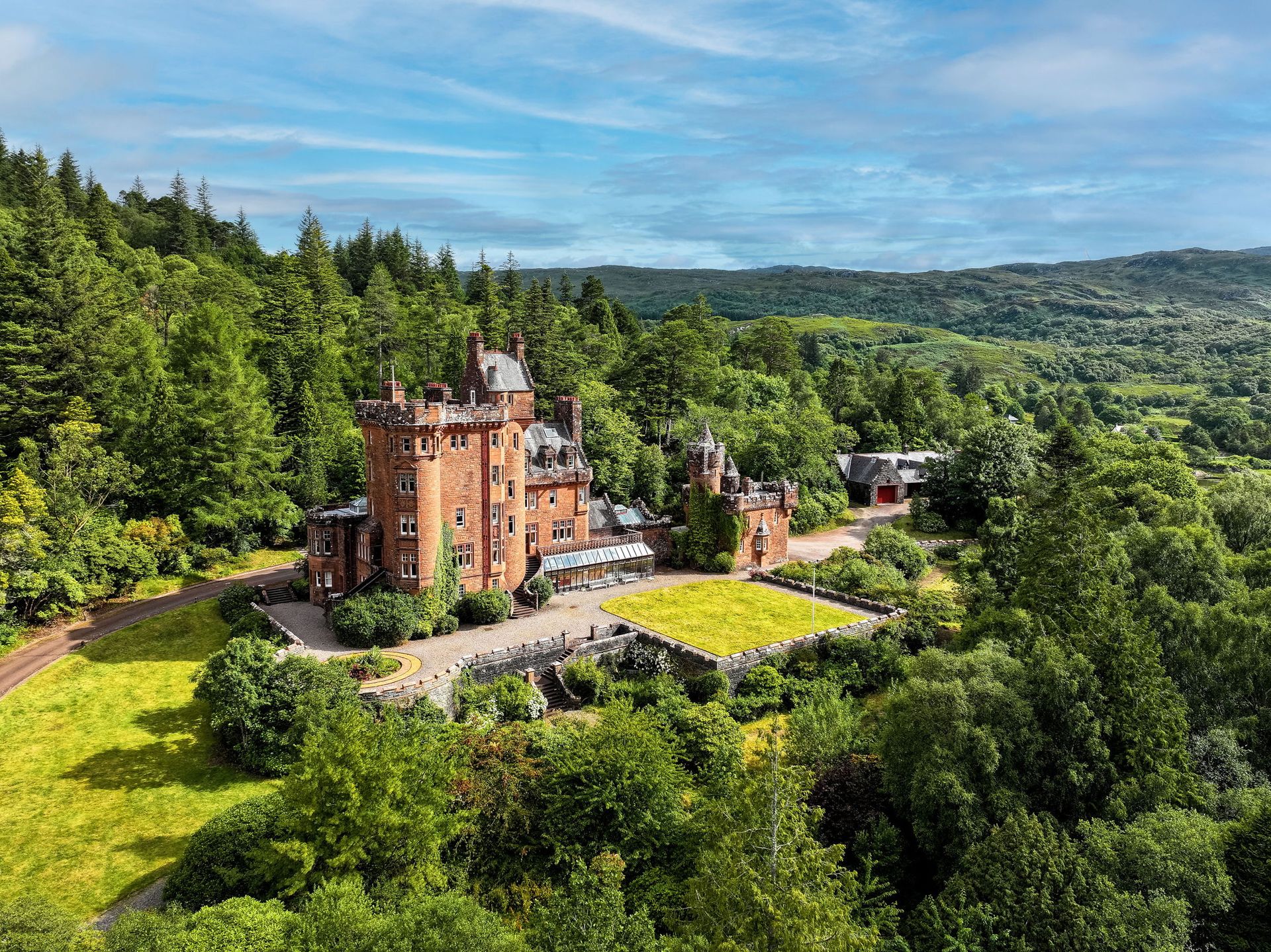 Two islands, one helipad, 130 acres and a 16-bedroom castle on Scotland ...
