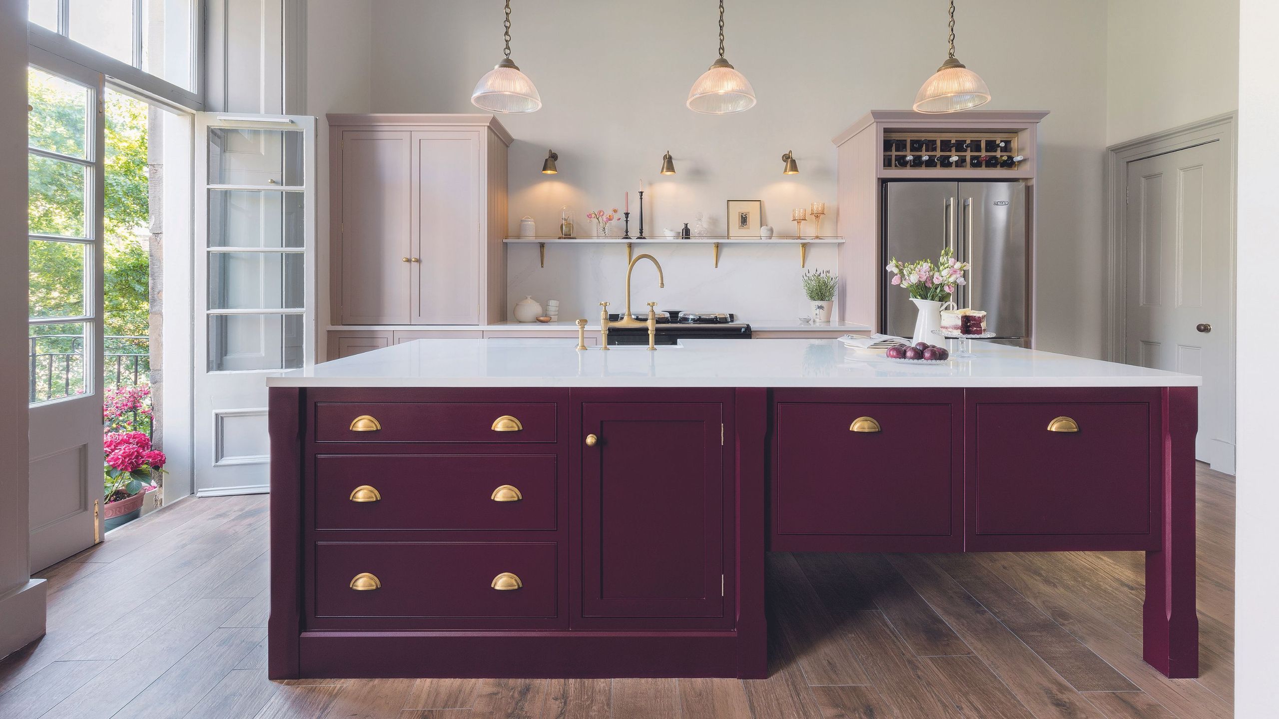Step inside this warm and welcoming kitchen decorated with hot hues ...