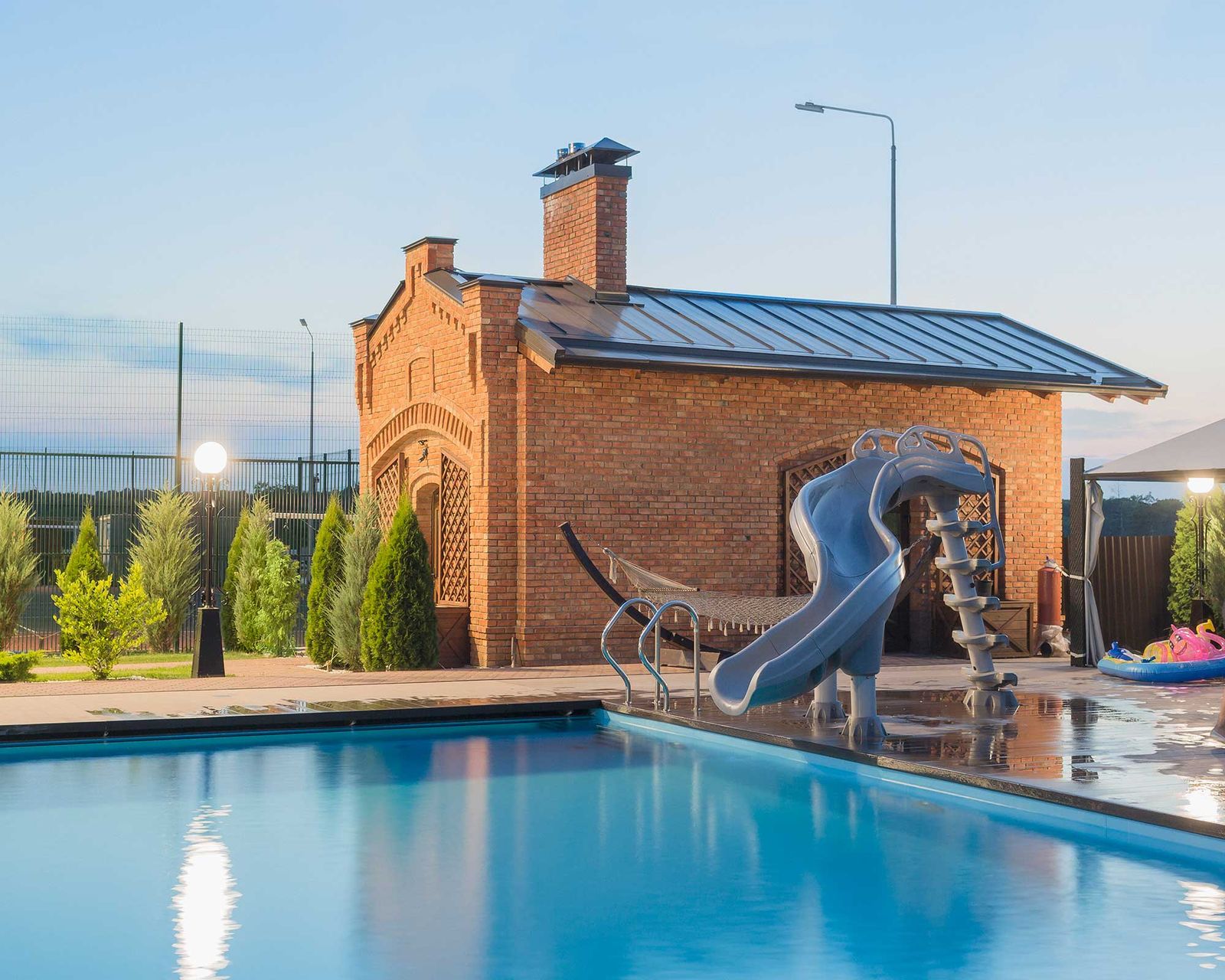 Pool slide ideas: 9 refreshing features to up the fun factor | Gardeningetc