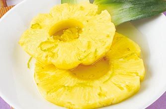 Poached pineapple with lime syrup | Caribbean Recipes | GoodtoKnow