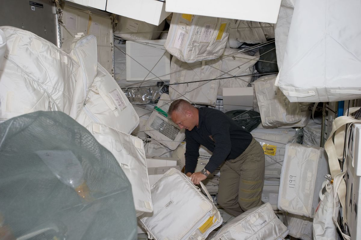 Astronauts Unpack Giant Space Locker in Orbit | Space