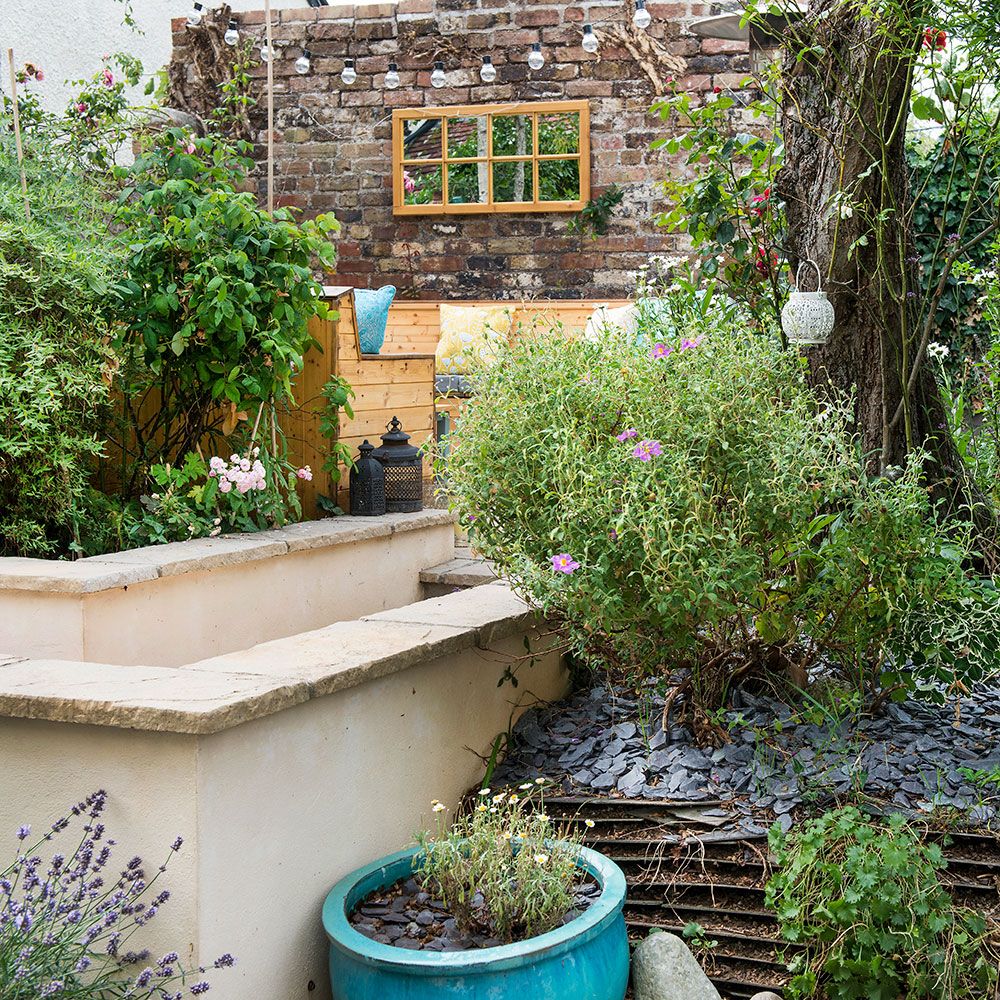 Multi-level courtyard garden makeover with banquette seating | Ideal Home