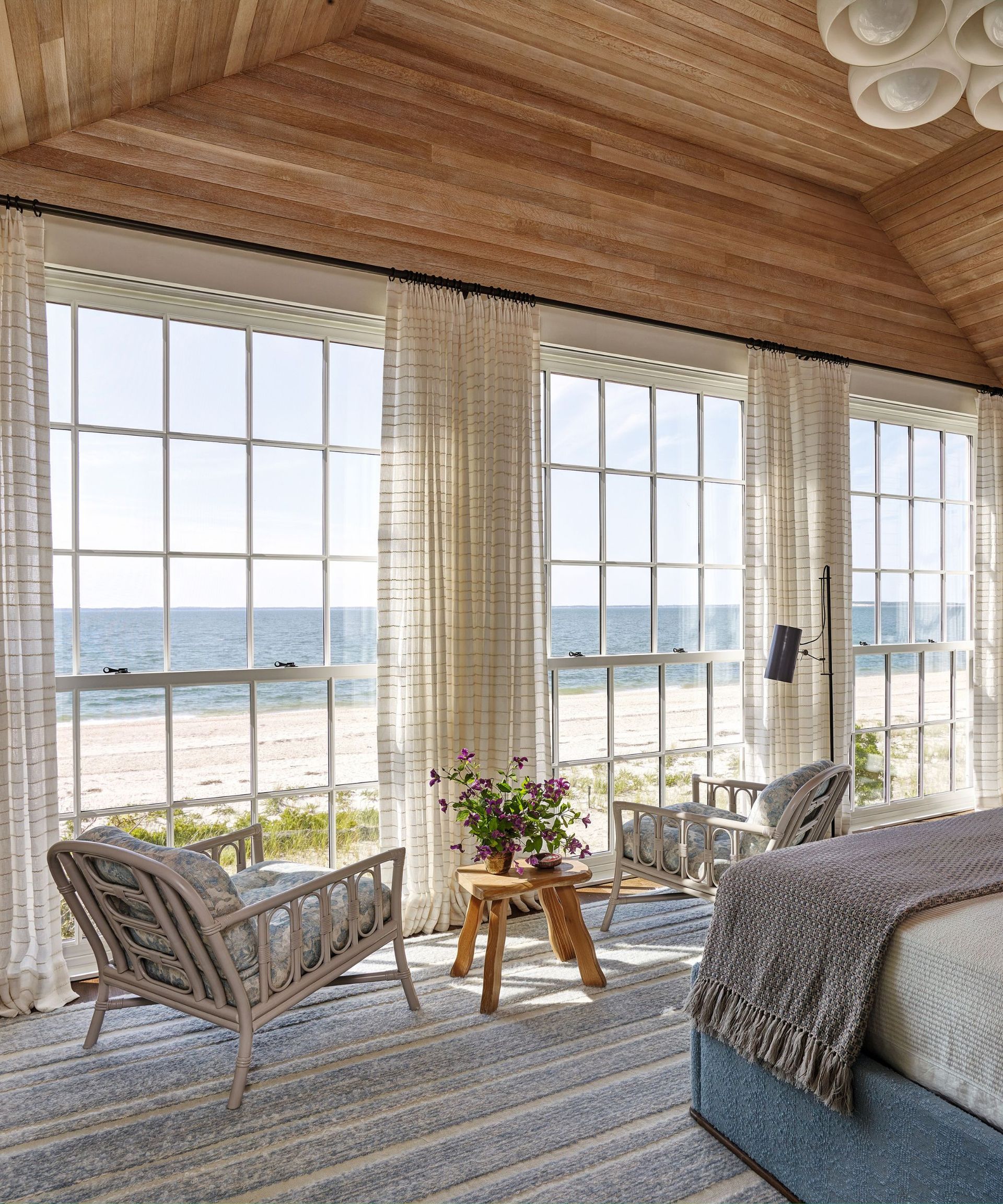 This Hamptons shingle beach house that sits on stilts six feet above ...