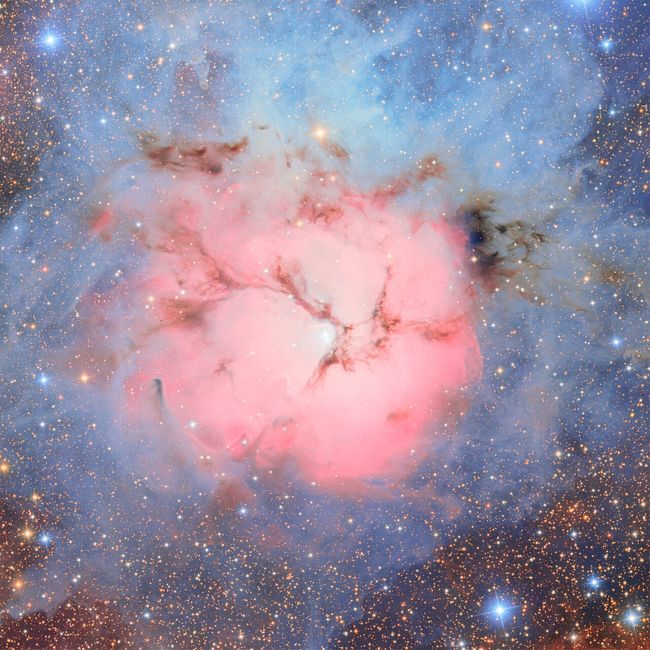 A cotton candy nebula glows in Vera C. Rubin Observatory's first close ...