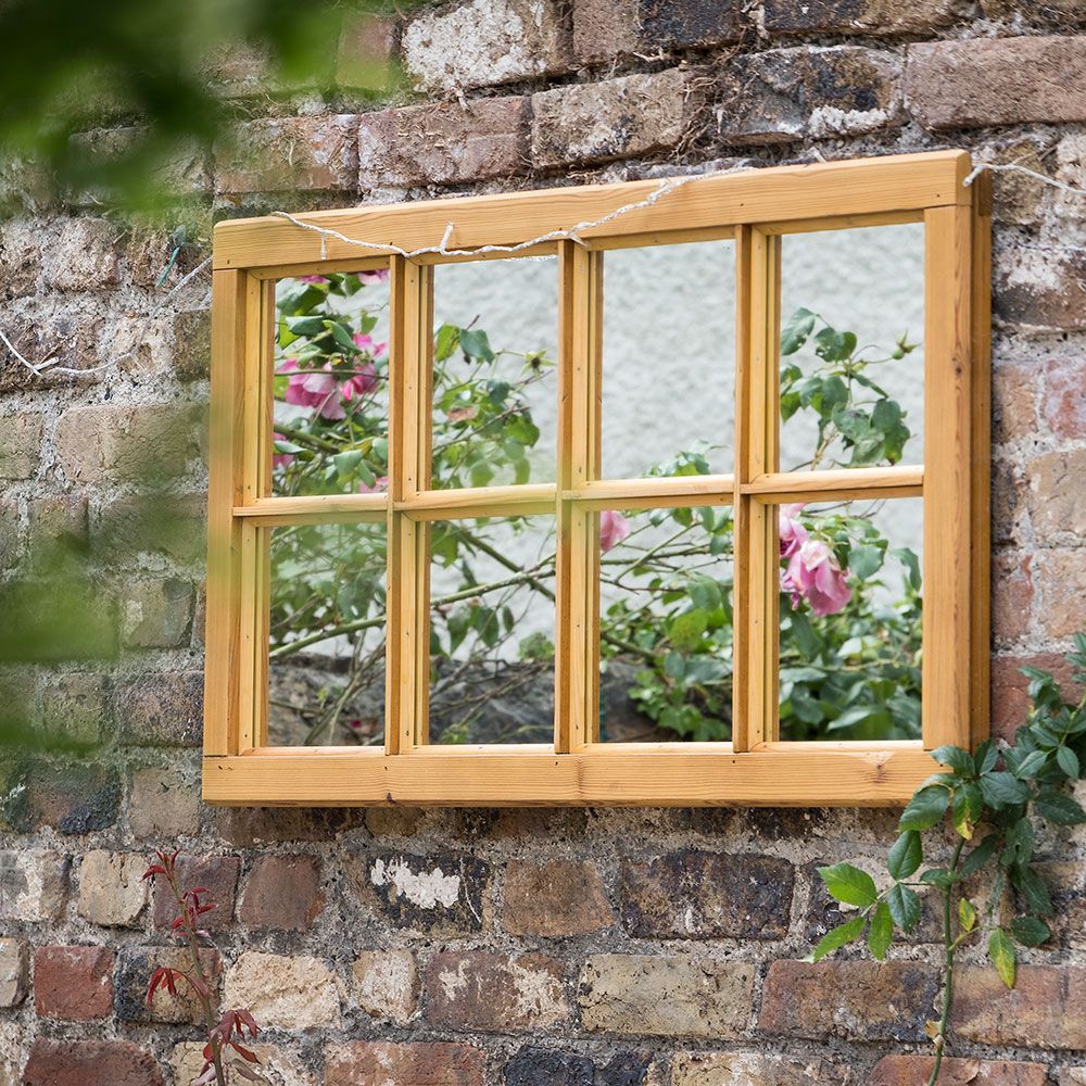 Multi-level courtyard garden makeover with banquette seating | Ideal Home