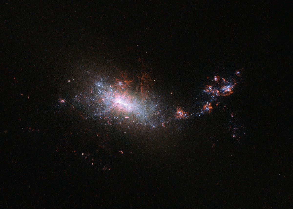Tiny Galaxy Bursting with Star Creation Is Spied by Hubble | Space