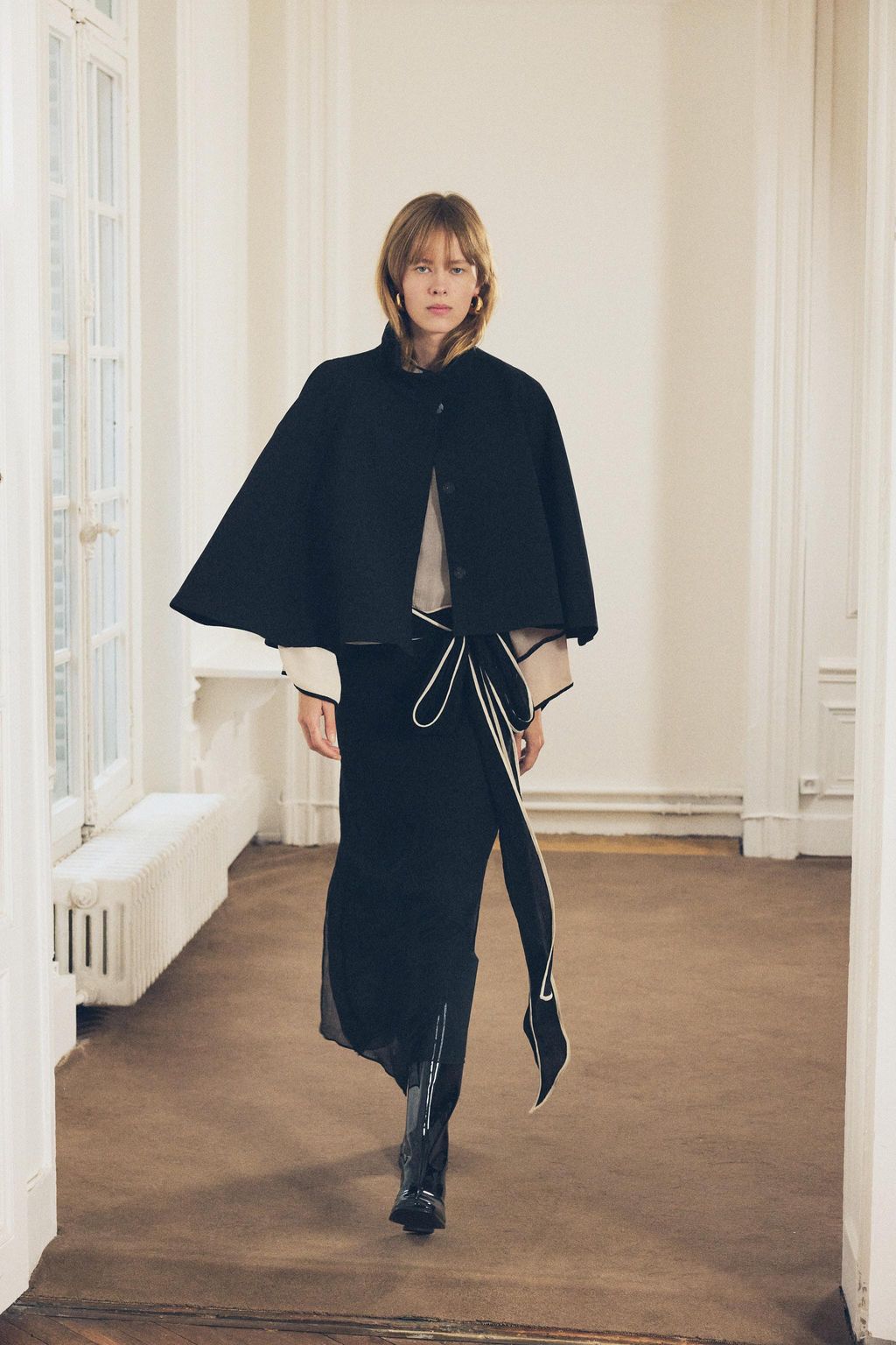 How to Style and Shop the Fall 2024 Cape Fashion Trend | Who What Wear