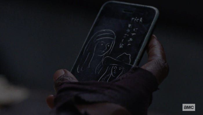 The Walking Dead Japanese phone mystery: Here's what it means, and how ...