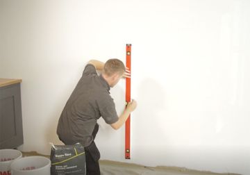 How to tile a wall – DIY guide to achieving a professional finish on a ...