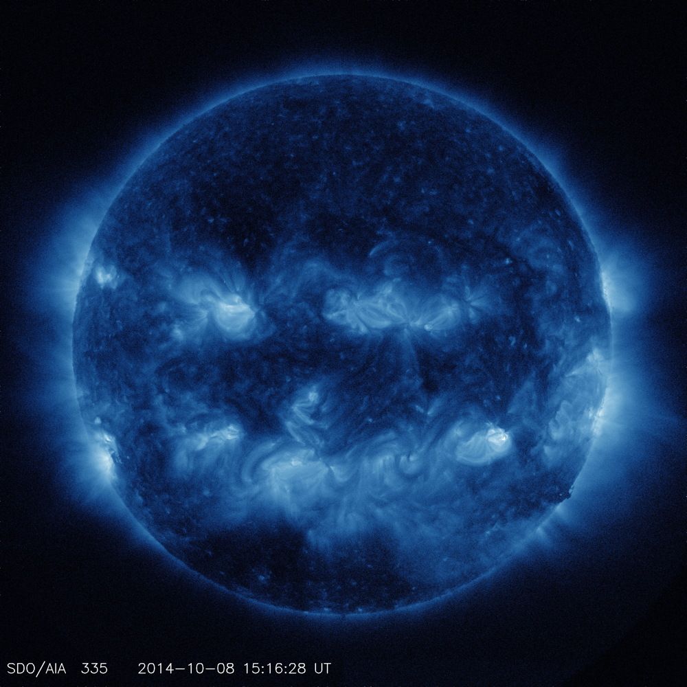 NASA Spots Creepy Face on the Sun (Photos) | Space