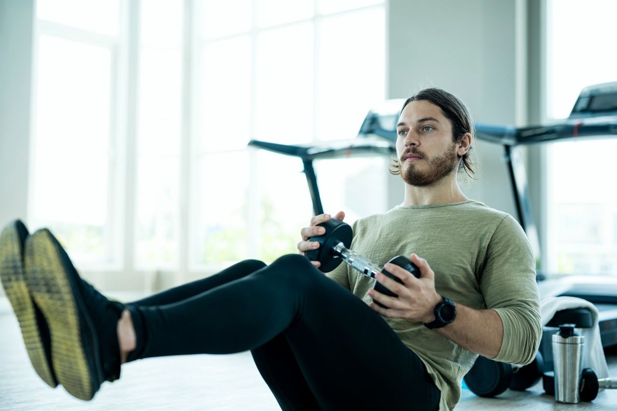 Burn Calories Fast With This Dumbbell Cardio Workout | Coach