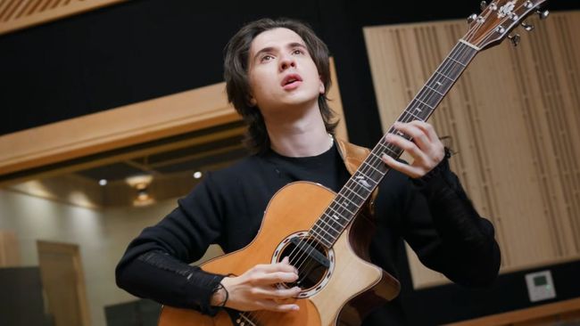 Marcin is "the true enemy of the guitar pick" | Guitar World