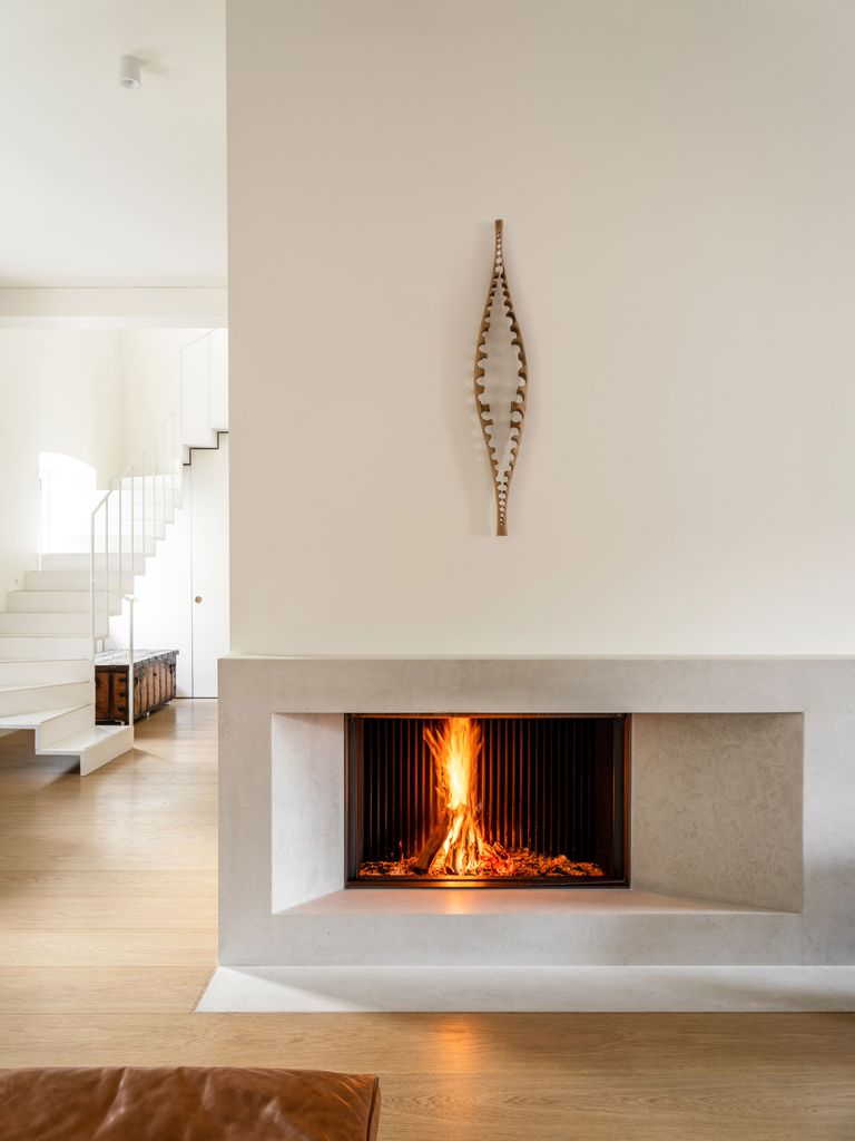 A modern apartment in Moscow where ornate antiques sit with minimalist ...