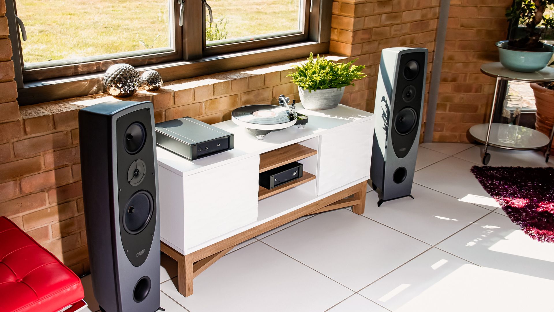 Rega's radical Aya speakers combine glass and cement for a striking ...