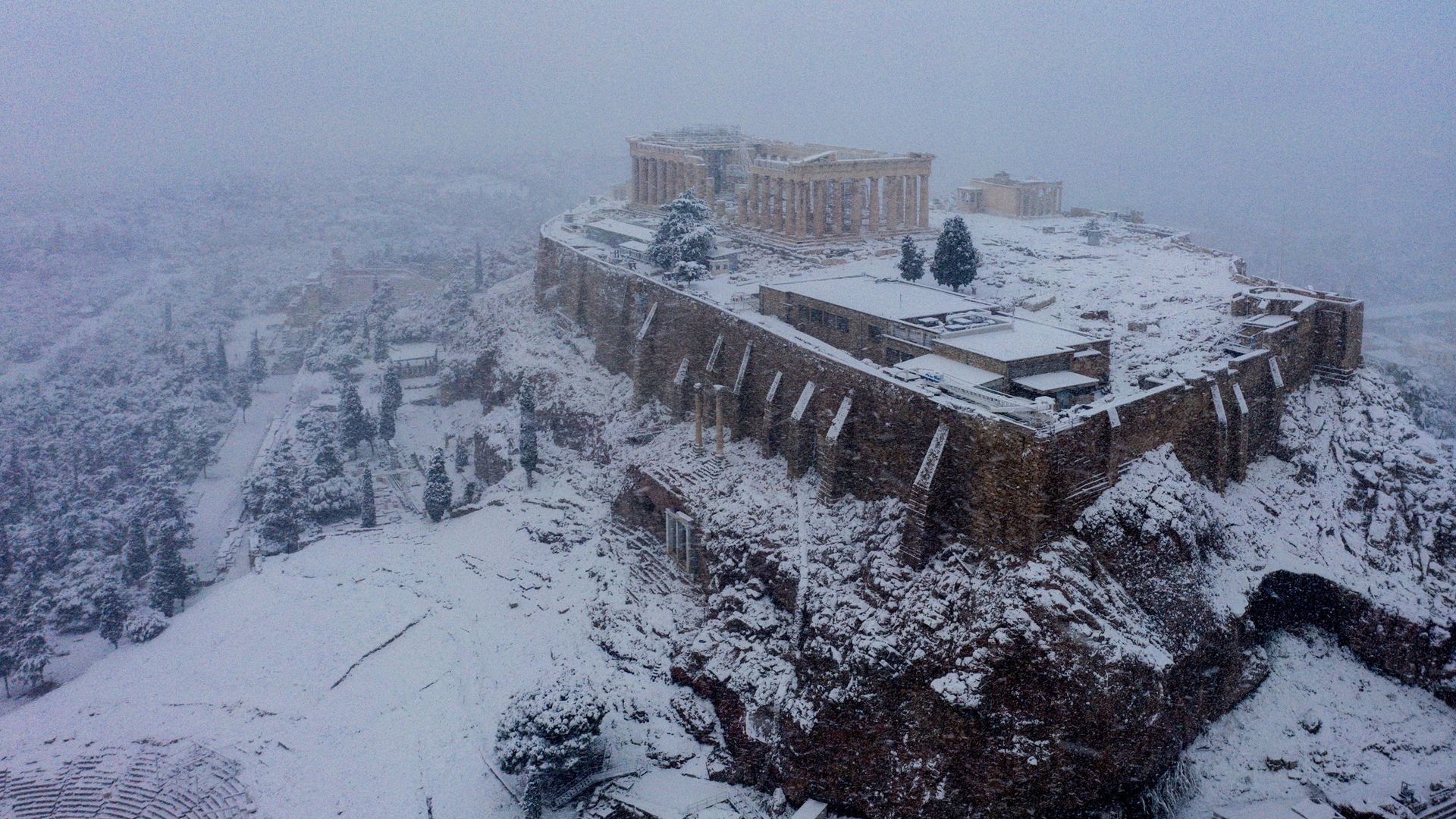 Rare snow covers Acropolis of Athens in dazzling white blanket | Live ...