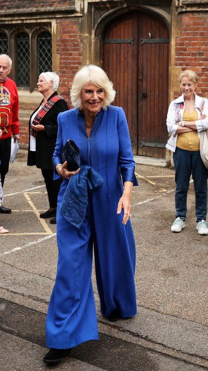 Queen Camilla nails the wide-leg trend in bold blue jumpsuit | Woman & Home