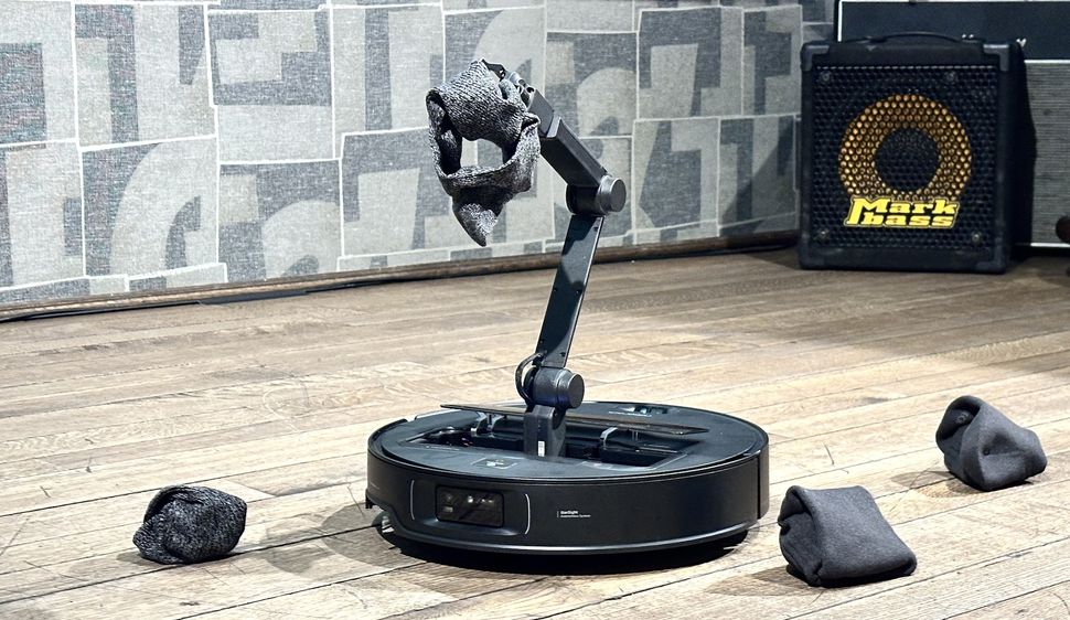 This new robot vacuum has a robotic arm that can pick up your socks ...