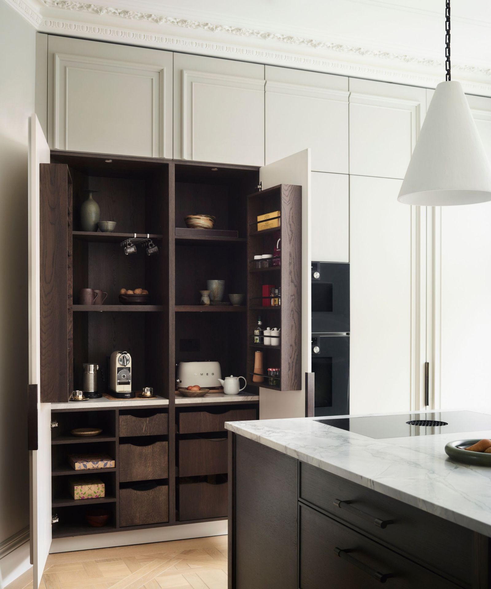 Tour this hidden kitchen where the design brief was to create a space ...