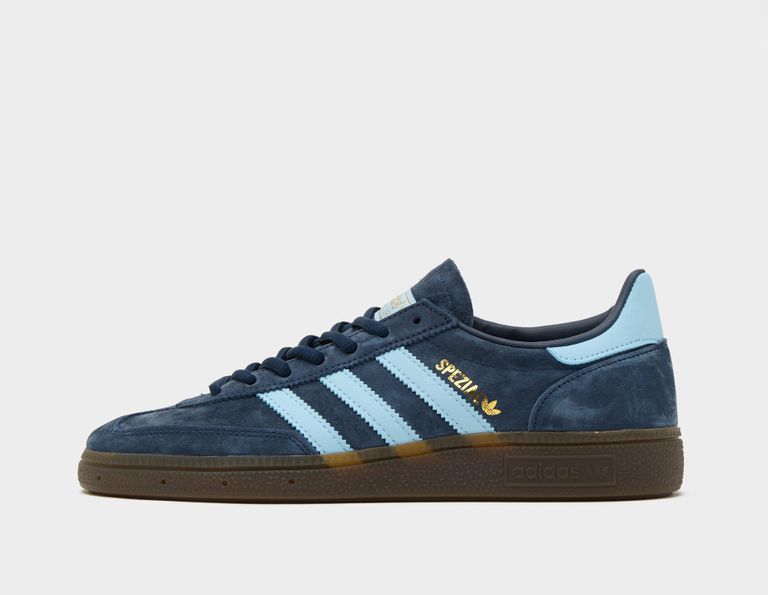 The Blue Trainers Trend Keeps Cropping Up In Chic Winter Outfits | Who ...