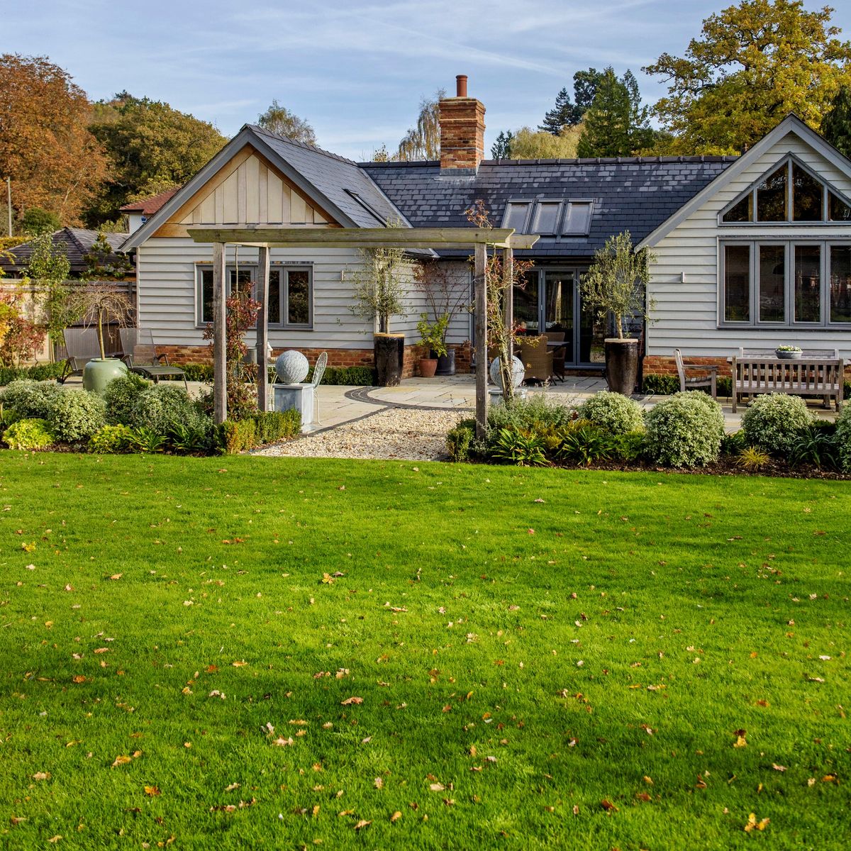 When to scarify a lawn for healthier and greener grass | Ideal Home