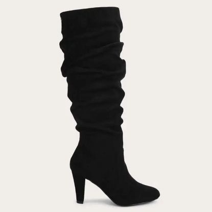 Queen Maxima steps out in the perfect knee-high boots | Woman & Home