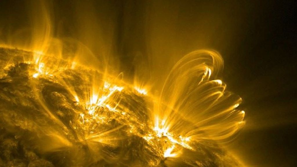 Invisible 'flickering' on the sun could predict potentially dangerous ...
