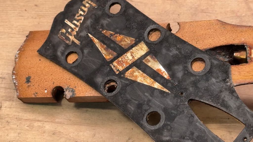 Ukrainian luthier restoring Les Paul burned by Russian drone strike ...