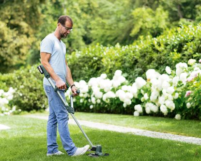 How to use a weed eater: expert tips to get a neat lawn | Gardeningetc