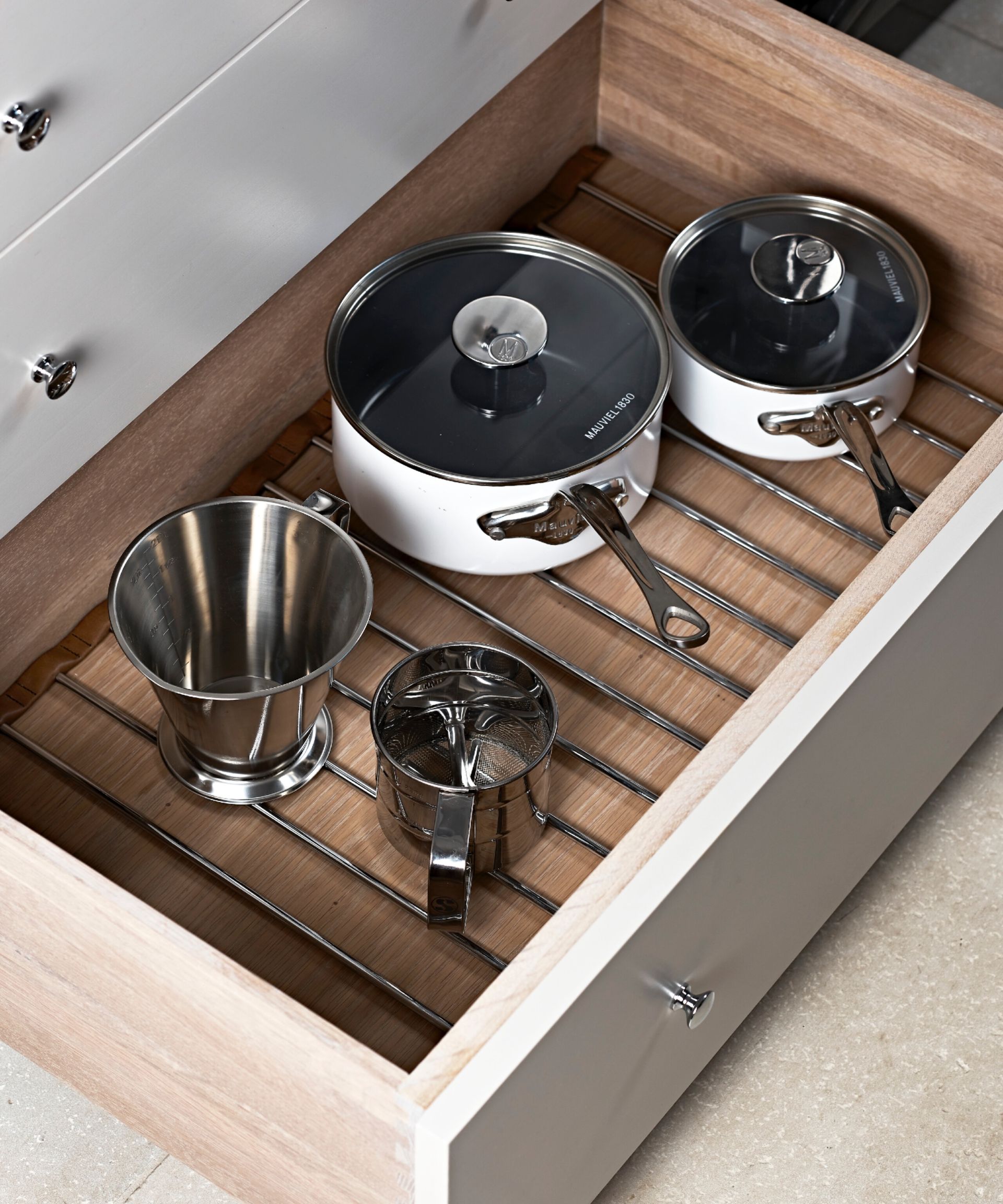 Organizing pots and pans: 10 ways to keep cookware neat | Homes and Gardens