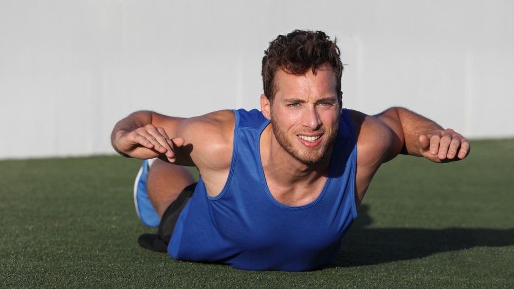 How To Do The Superman Exercise | Coach