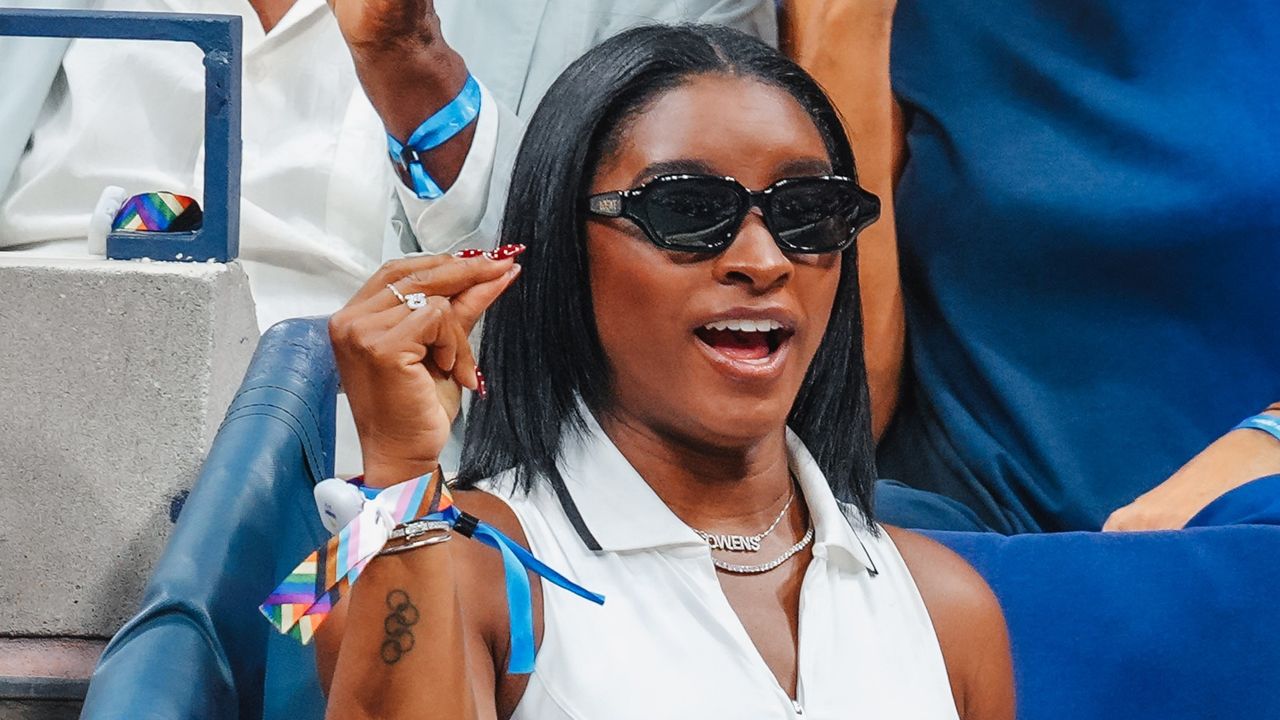 Simone Biles Swaps Her Lob for Bombshell Curls in NYC | Marie Claire