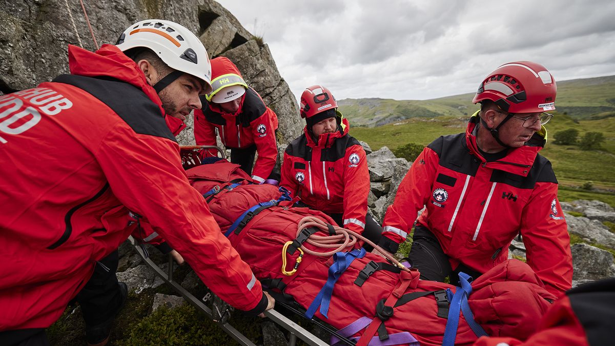 What do mountain rescue team members wear on operations? | Advnture
