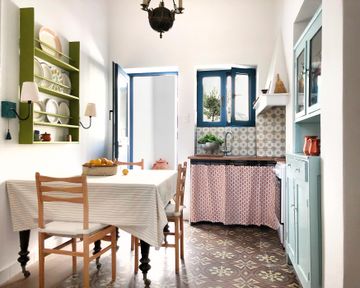 Explore a charming Greek villa that's had a colorful update to its ...