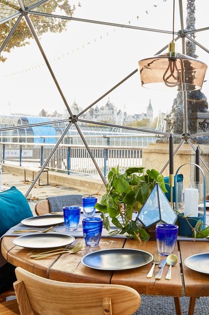 Want a unique dining experience? Try a snow globe with an insta interior