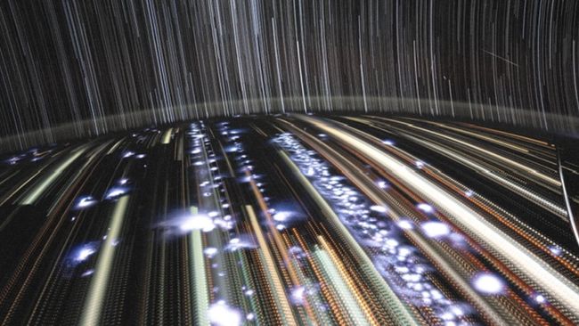 Astronaut takes a mind-bending trip over Earth beneath star trails ...