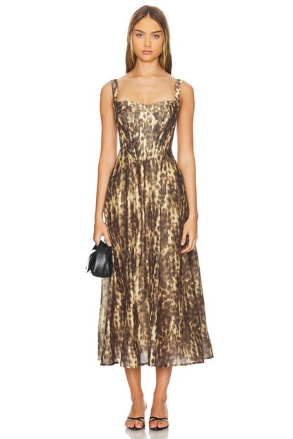 Chrissy Teigen Wore Fall's Most Maximalist Dress Trend | Who What Wear