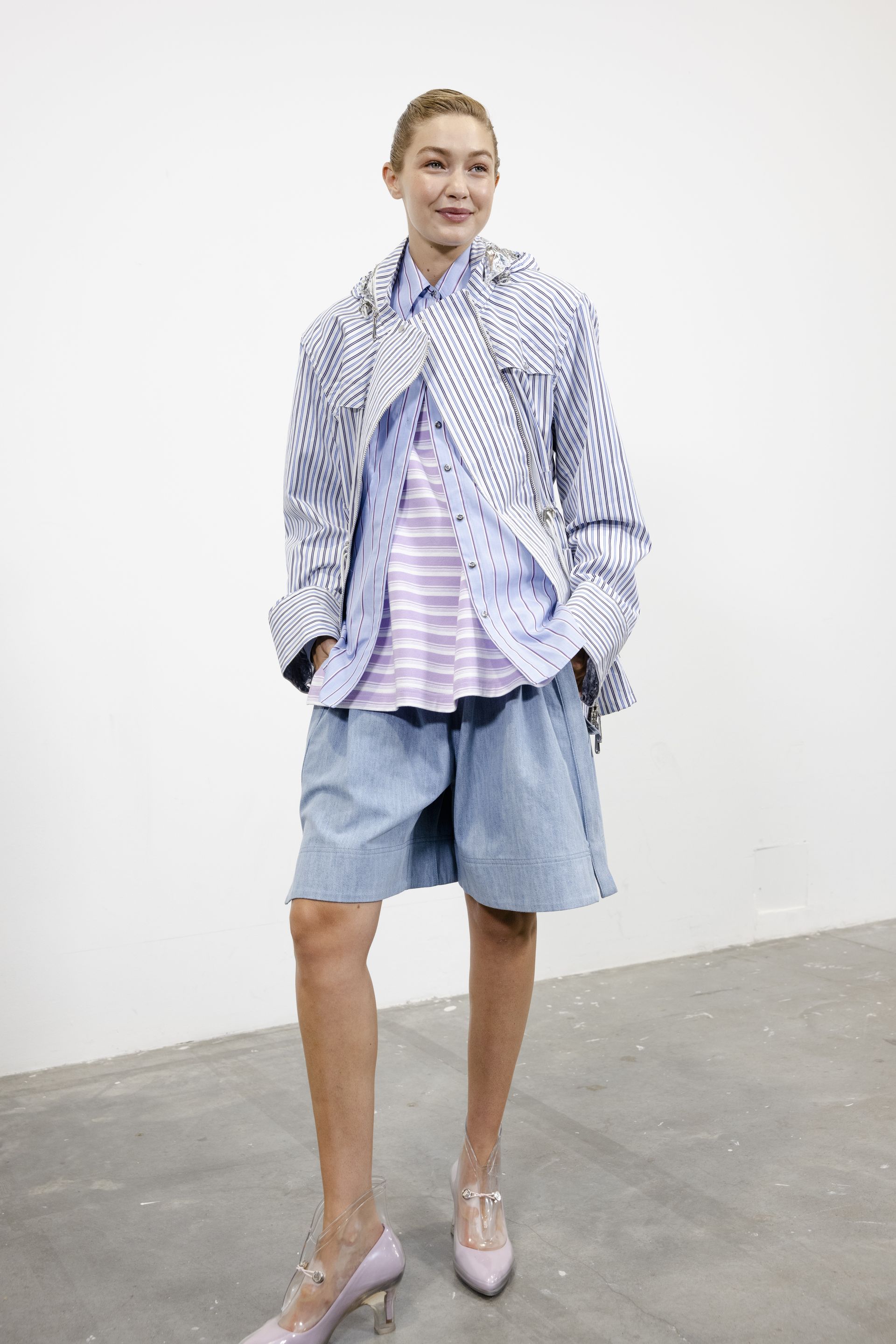 Gigi Hadid Wraps Herself in a DHL Tape Mini Dress for Vetements's Paris ...