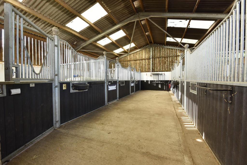 A Georgian mansion on the Suffolk/Essex border with racing-yard-quality ...