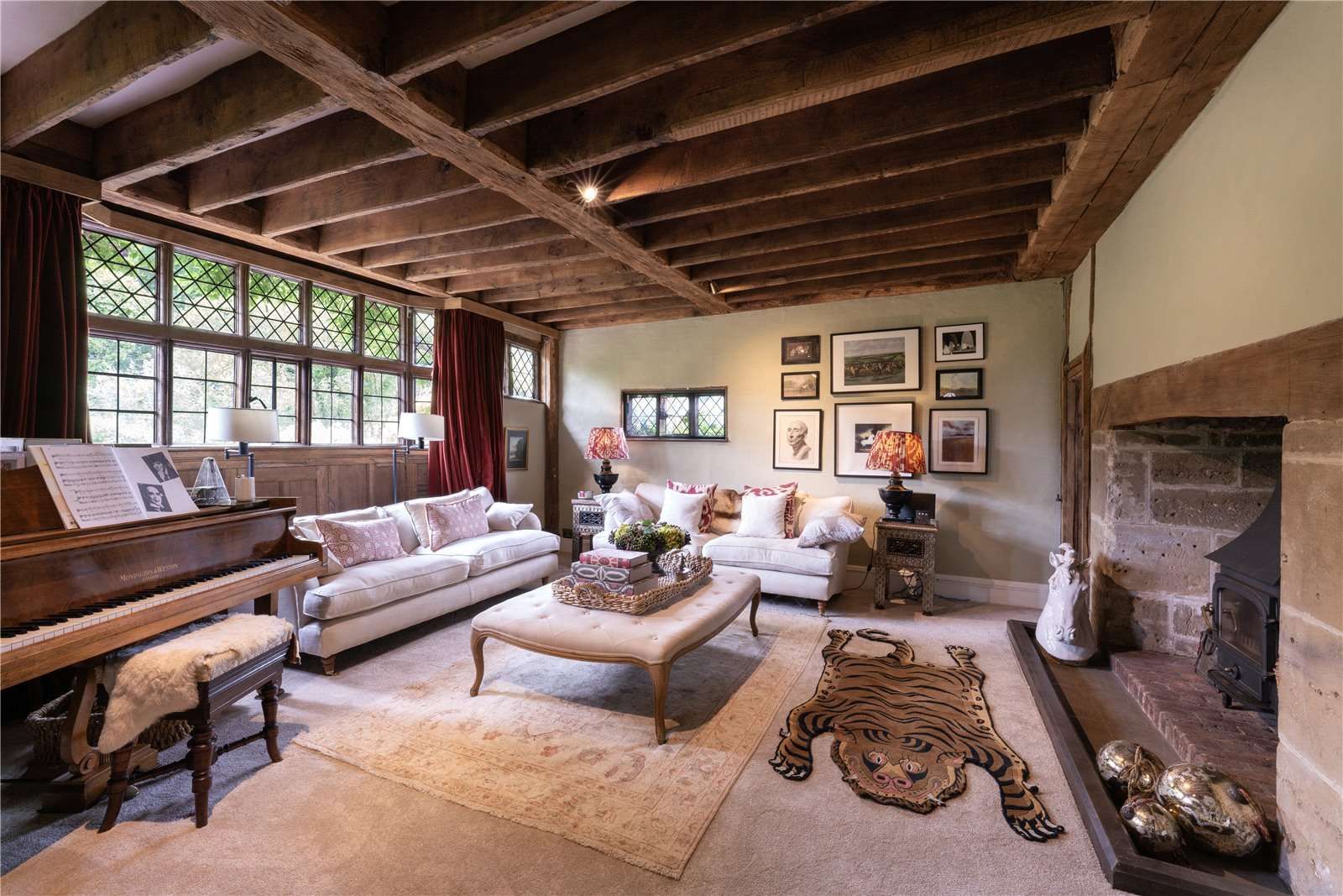 Beams, flagstone floors and leaded windows in a glorious old manor ...