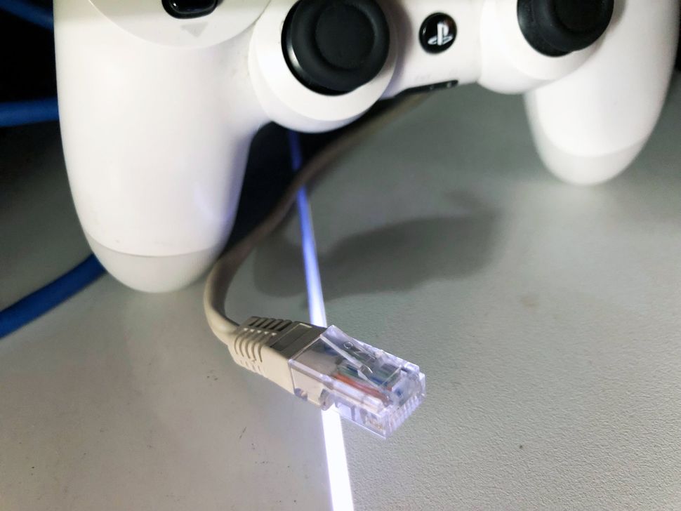 Should you use an ethernet cable to play PlayStation 4 online ...