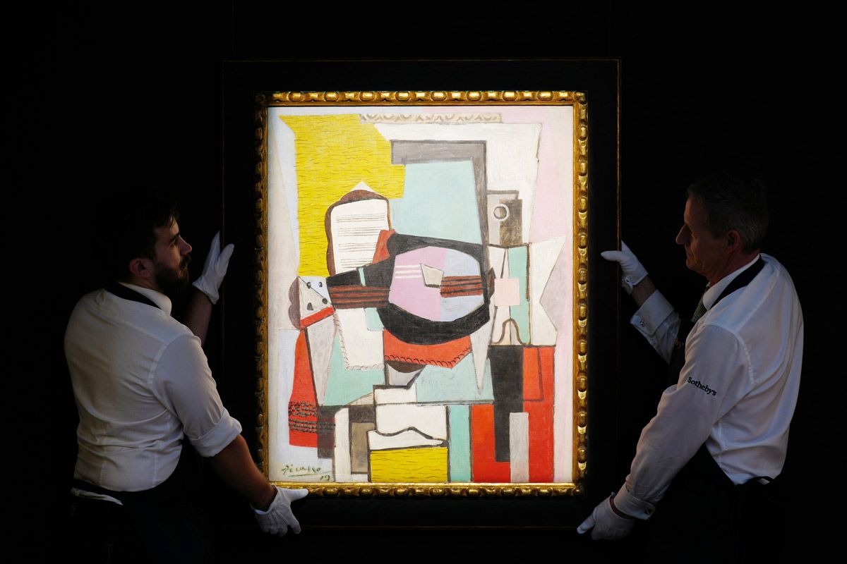 A Picasso painting depicting a guitar on a table has sold at auction ...