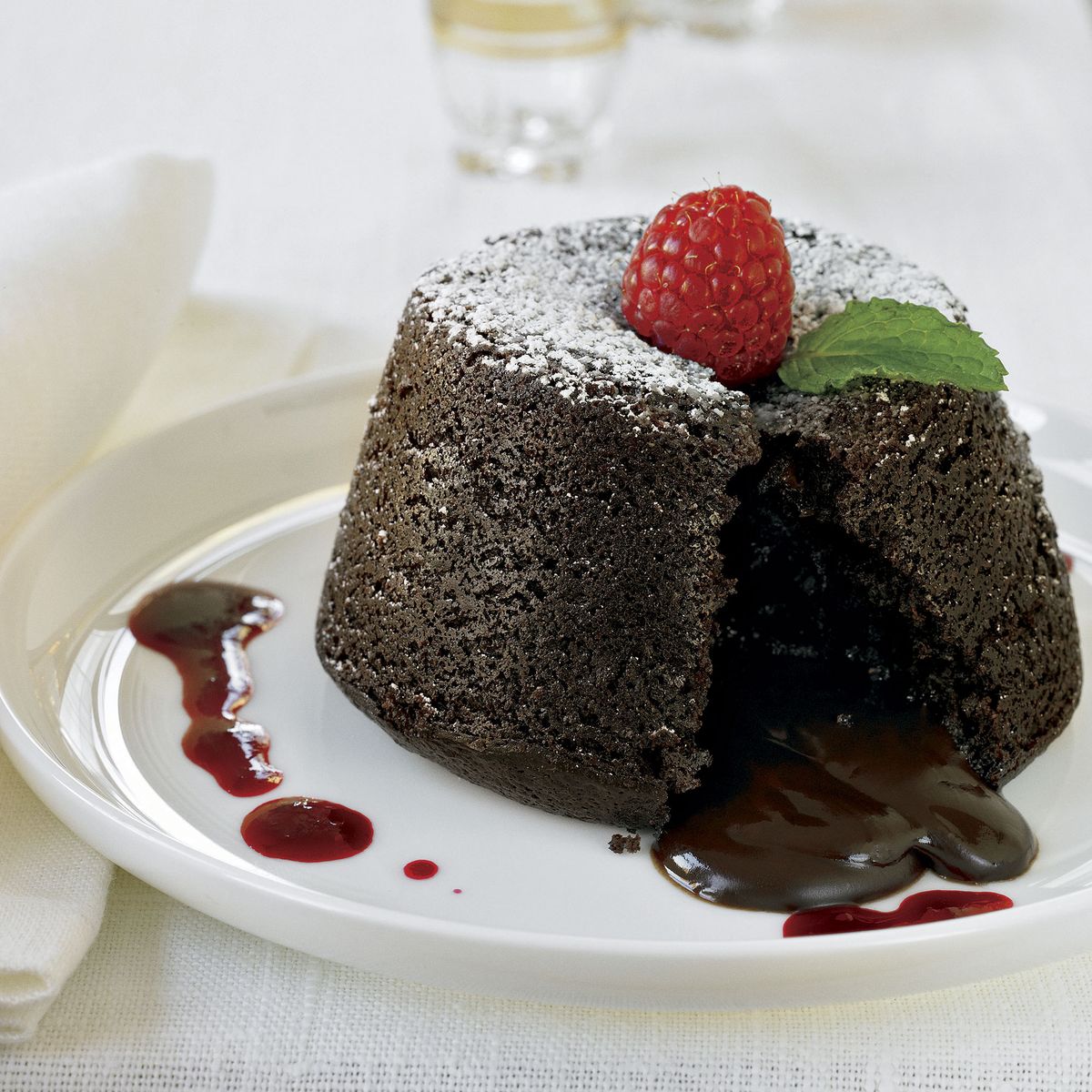 Chocolate Molten Lava Cakes with Raspberry Sauce Recipe | Woman & Home